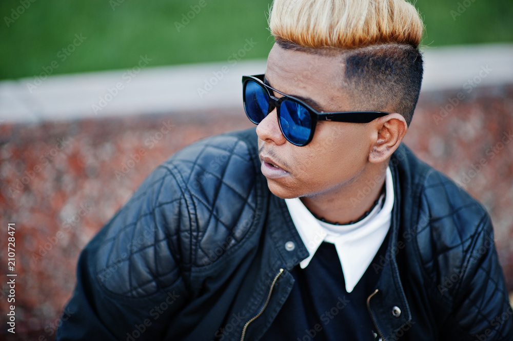 Stylish arabian muslim boy with originally hair and sunglasses posed on ...