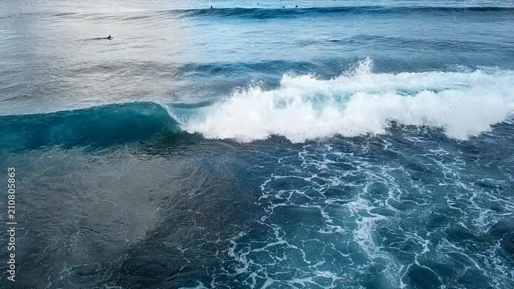 surf spot with men surfers and waves from ocean power. vacation scenic ...