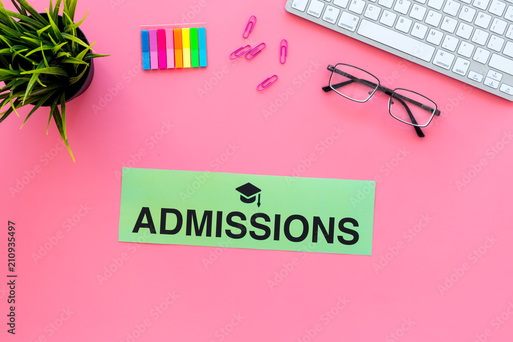 College admission concept. Word admissions with graduation cap sign on ...