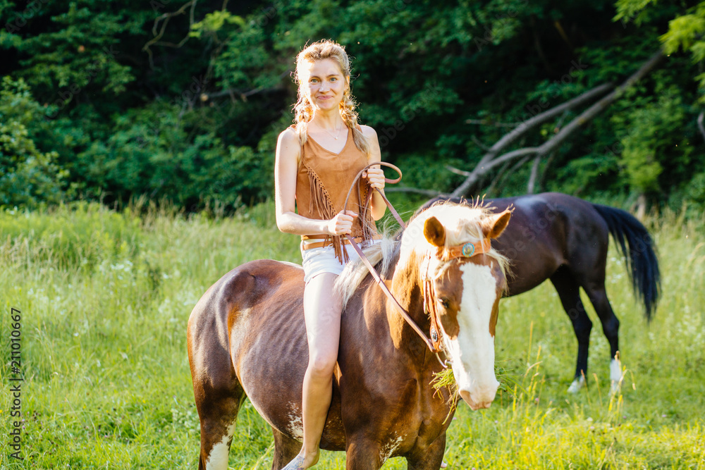 Beautiful woman on a horse. Horseback rider, woman riding horse. Riding ...