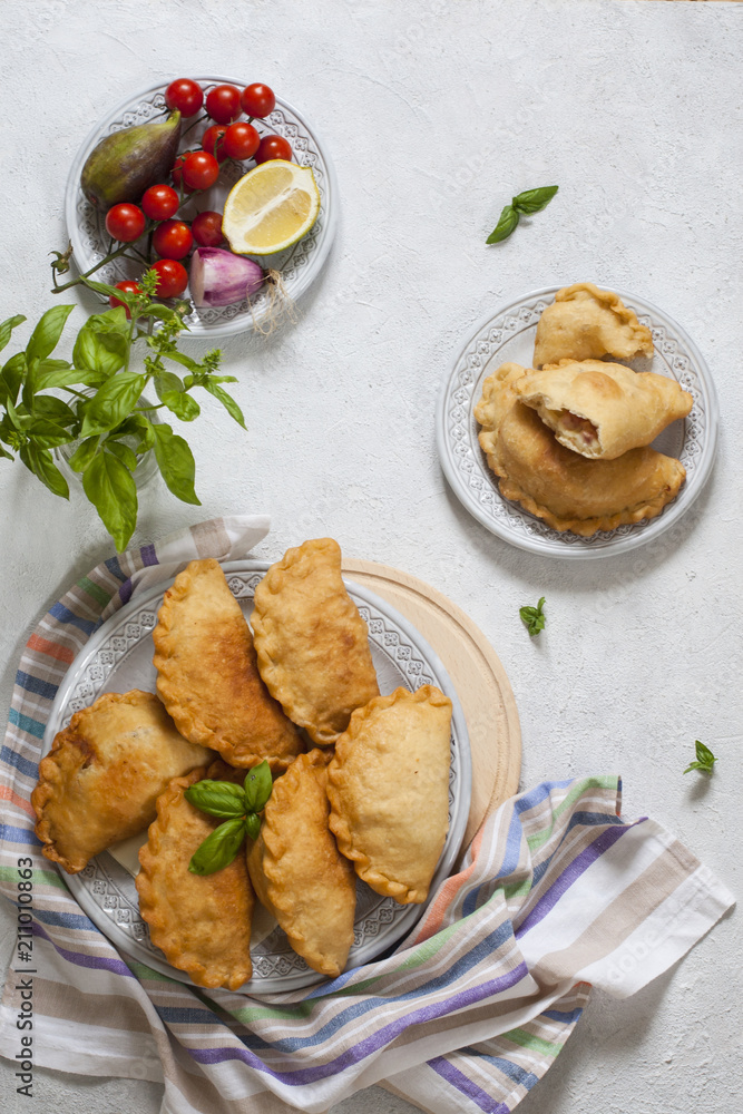 Panzerotti - a savory fried turnover traditional for Southern Italy ...