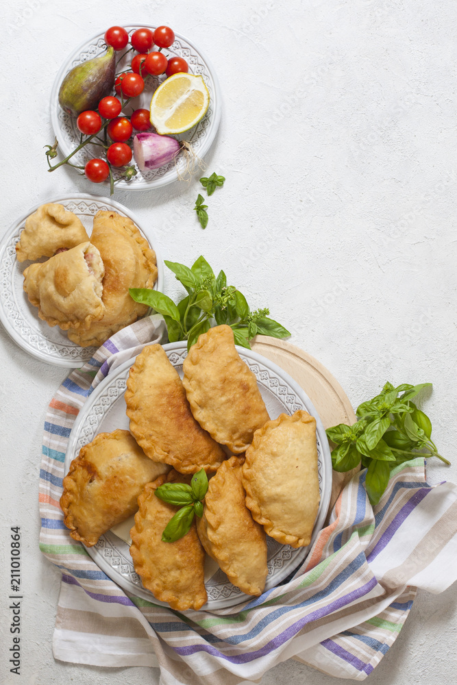 Panzerotti - a savory fried turnover traditional for Southern Italy ...