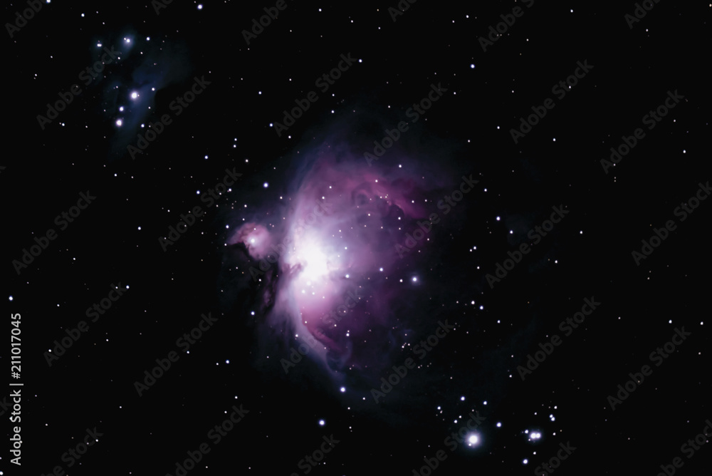 M42, the Orion Nebula is the middle star in Orion's "sword" and is ...