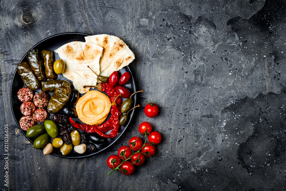 Arabic traditional cuisine. Middle Eastern meze platter with pita ...