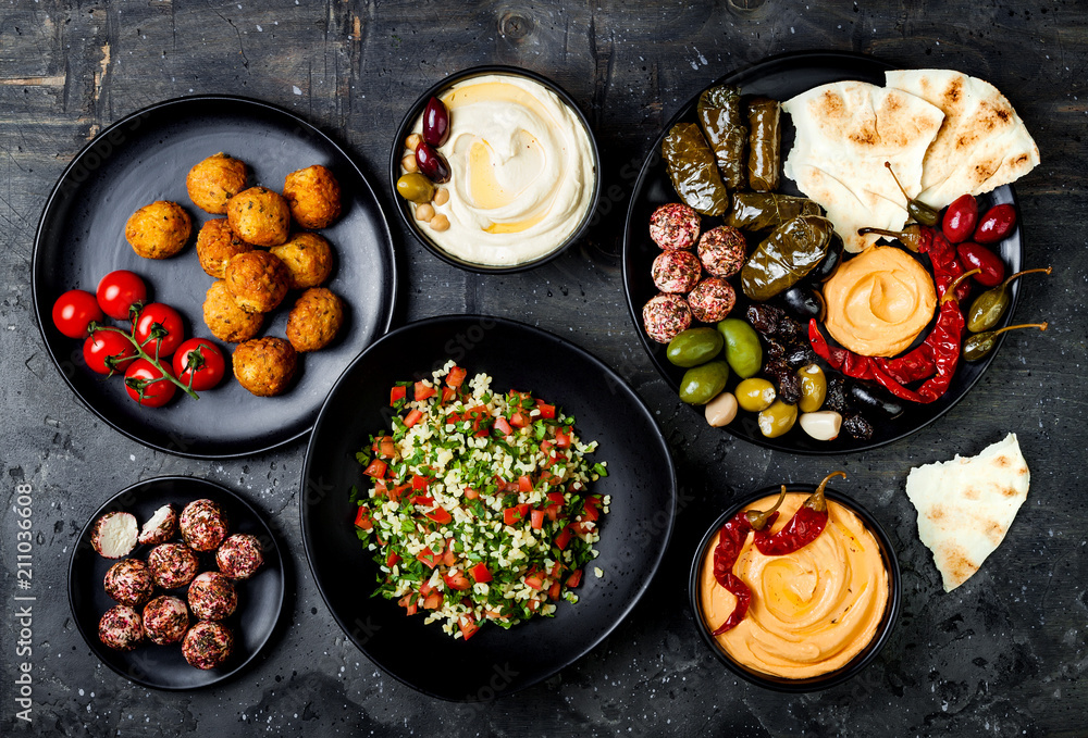 Arabic traditional cuisine. Middle Eastern meze platter with pita ...