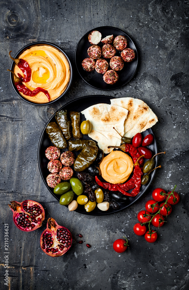 Arabic traditional cuisine. Middle Eastern meze platter with pita ...