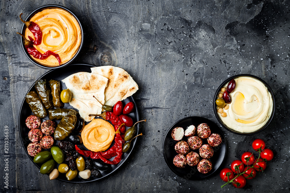 Arabic traditional cuisine. Middle Eastern meze platter with pita ...