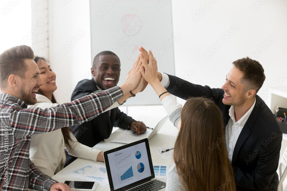 Excited diverse millennial group giving high five celebrating online ...