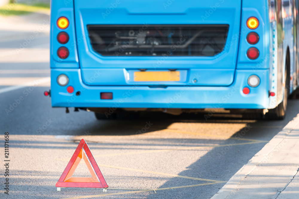 The orange triangle, the emergency stop sign, exhibited by the driver ...