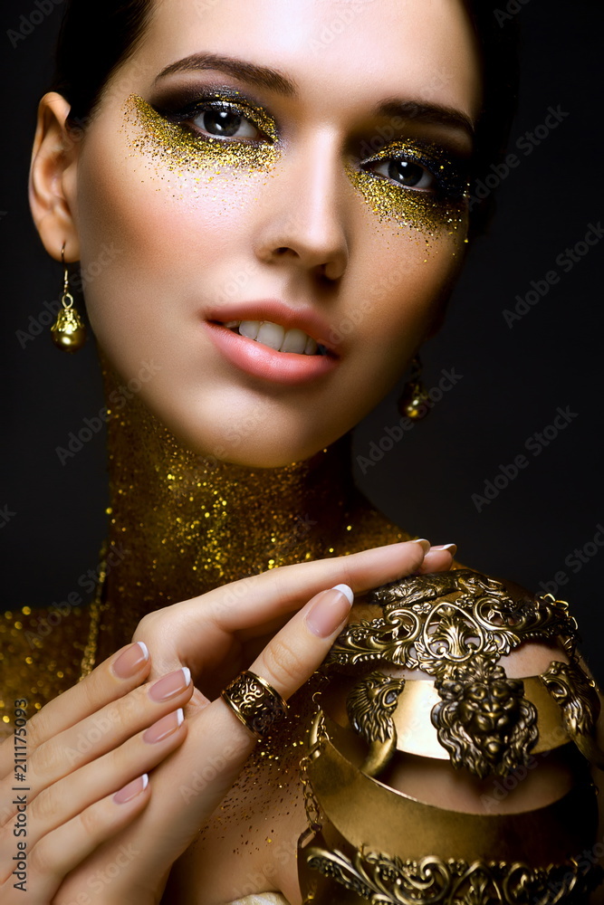 Portrait of Beautiful Woman with Golden Sparkles on her Face. Girl with ...
