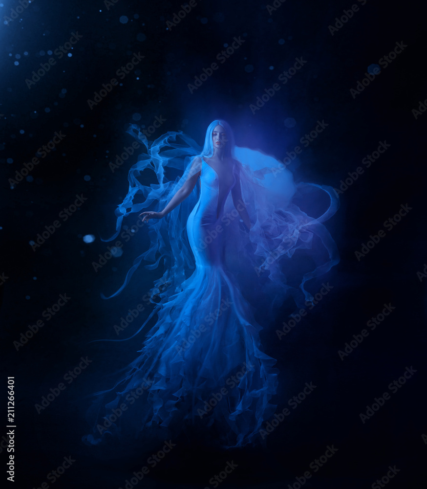 A jellyfish girl floating in levitation on a dark ocean floor. A ...