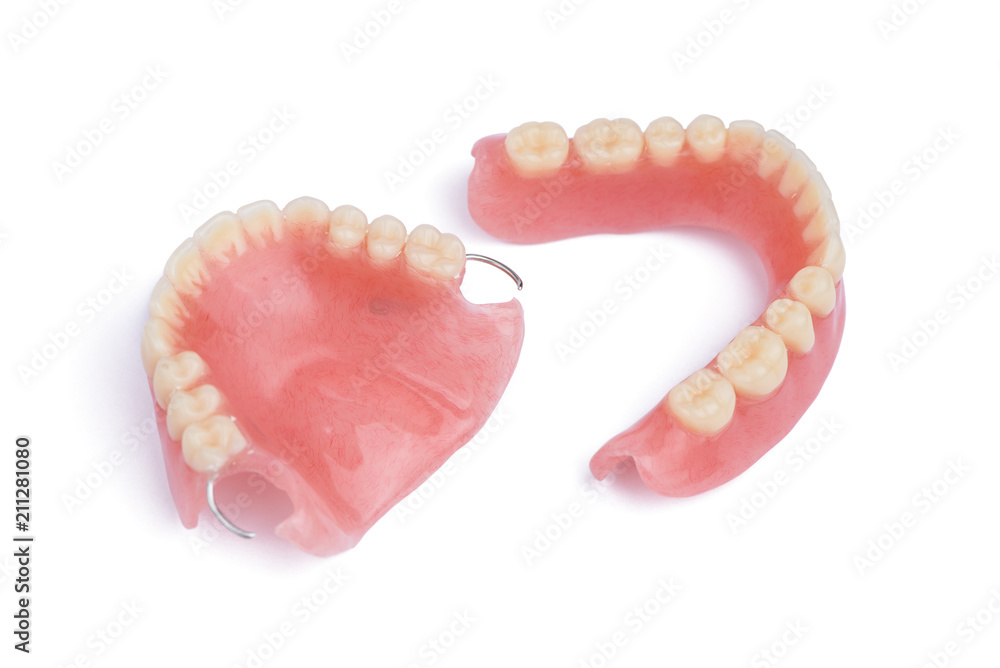Complete set of false teeth. Isolated on white background. Stock Photo ...