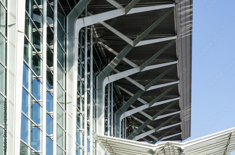 Detail of modern architectural shelter roof with white steel wing ...