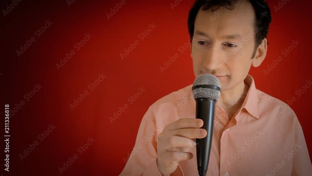 A funny ugly man telling something to an audience, waiting for the ...