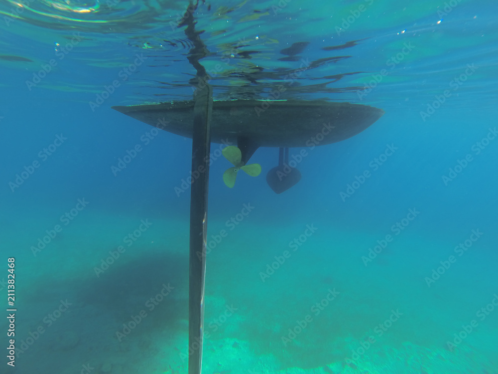 Underwater parts of a modern sailing yacht. Keel, screw and rudder ...