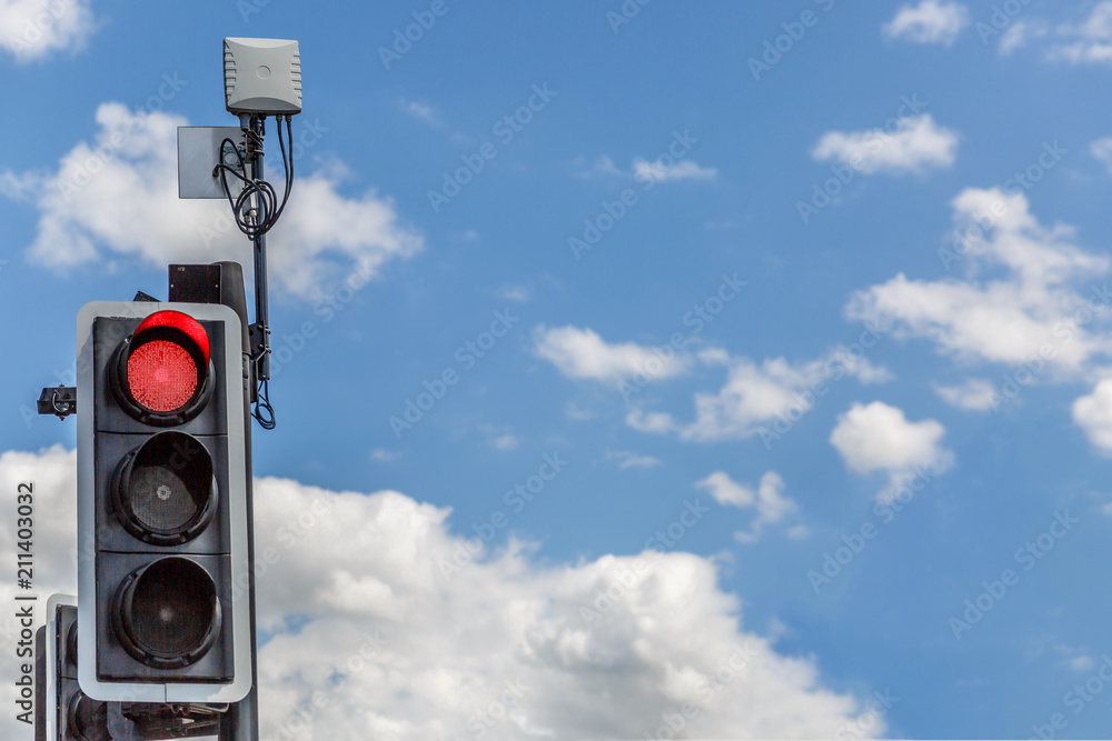 Traffic light illuminated in red, with a lovely sky background Stock ...