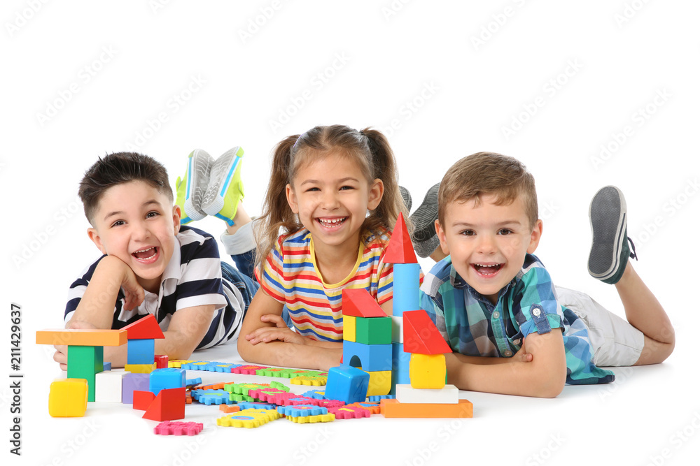 Little children playing together on white background. Indoor ...