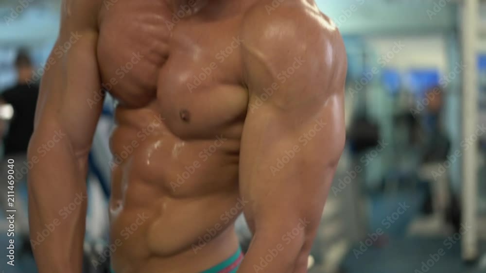 Close up of a beautiful ABS and chest muscles male. Muscular man ...