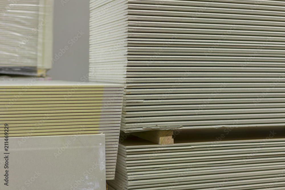 Pallet with plasterboard in the building store. Warehouse with ...