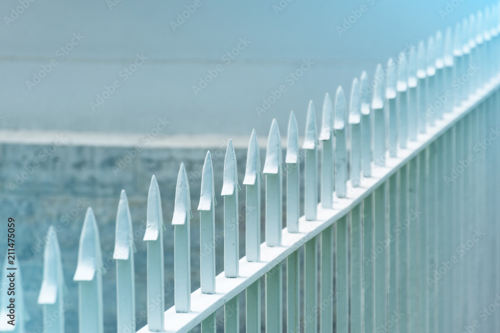The sharp tip of the metal fence of the fence row. Stock Photo | Adobe ...