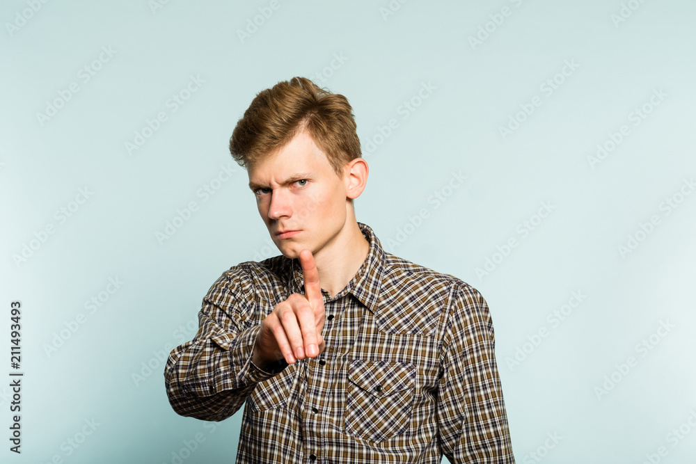 no. forbidden. don't do it. serious frowning man hand gesture. portrait ...