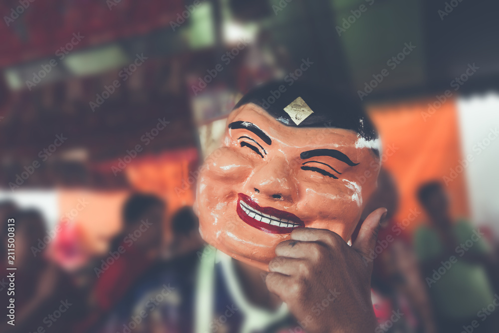 Popper smiling mask in Chinese new year lion dance shows . old man ...