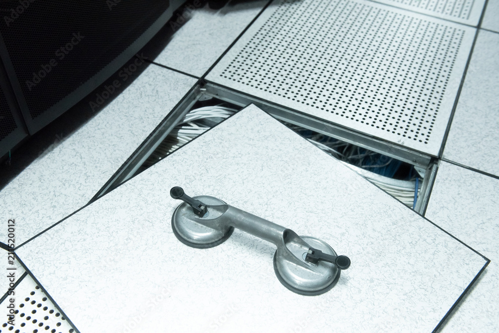 Lifted raised floor and suction tools in datacenter Stock Photo | Adobe ...