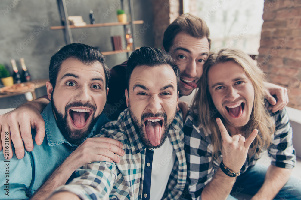 Self portrait of four attractive comic crazy funny foolish guys with ...