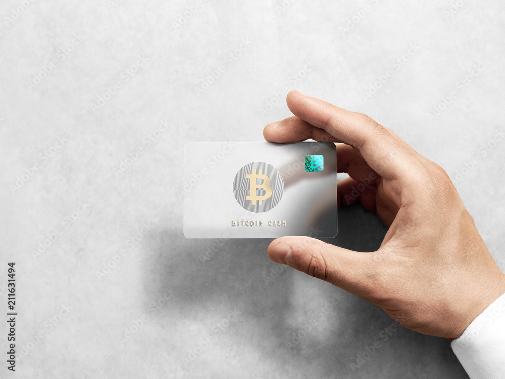 Foto de Hand holding bitcoin card template with rounded corners and ...