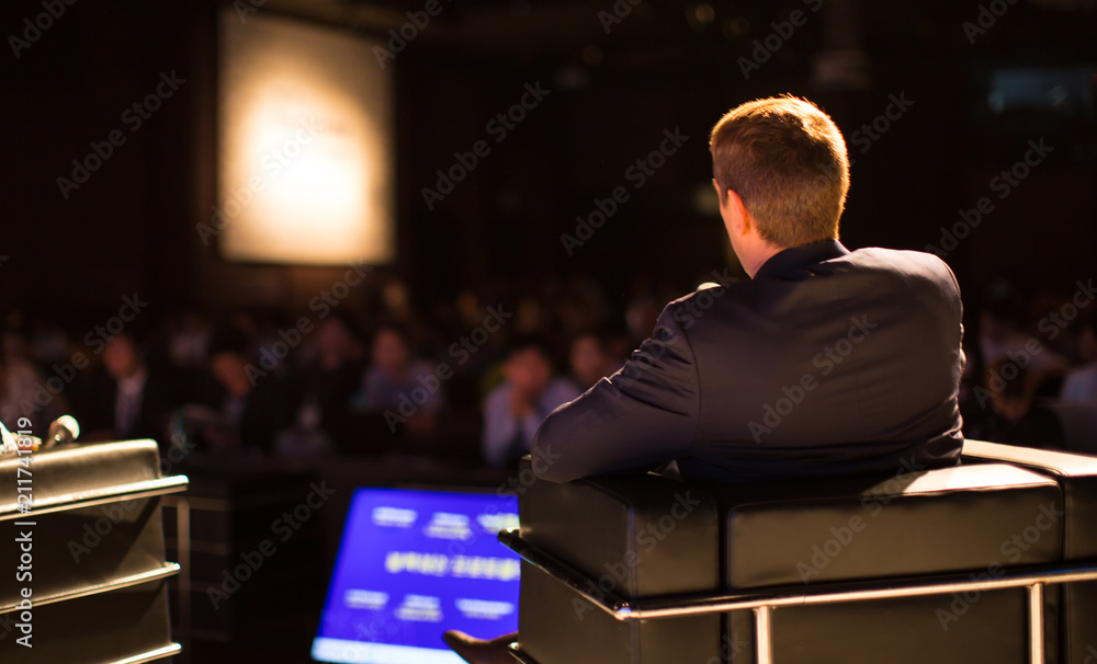 Presenter Presenting on Stage at Conference Hall Meeting Panel ...