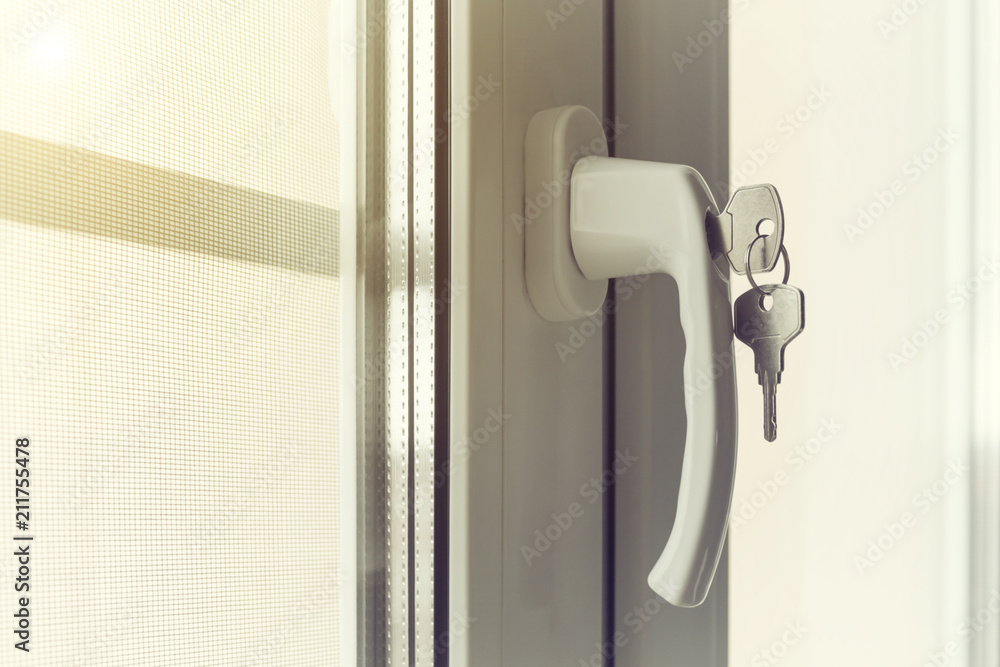 The concept of protecting a child from falling out of windows. Handle ...