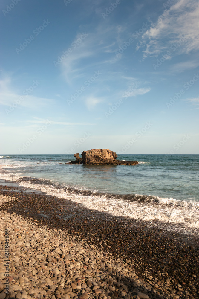 A view of a famous rock formation at El Tunco Beach in El Salvador ...