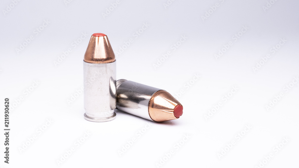Silver bullets with white background Stock Photo | Adobe Stock