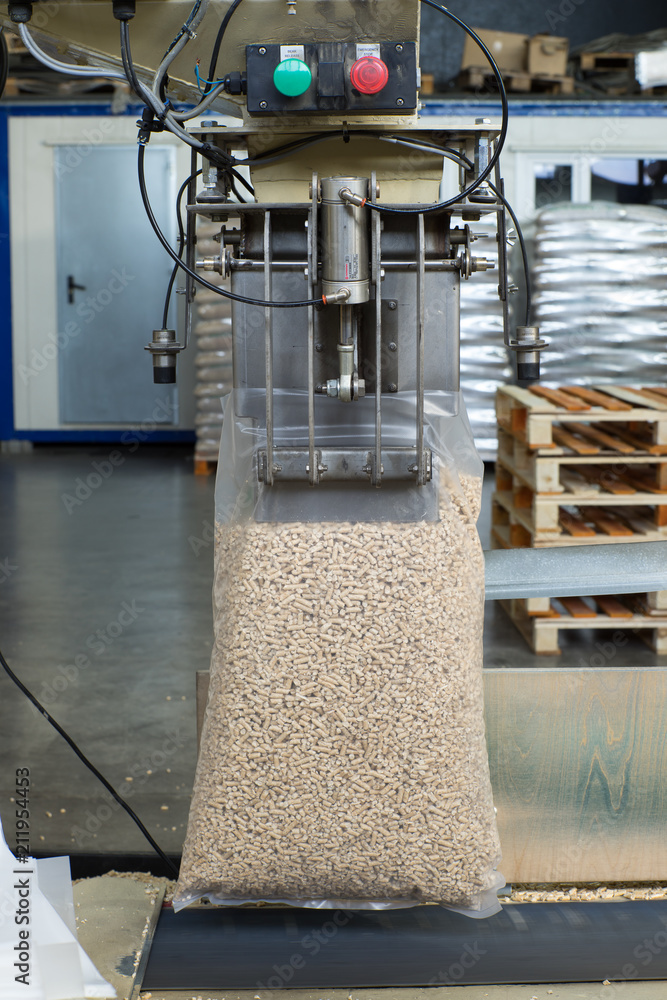 Packing and storage of bio granules. Granulated wooden fuel, bio ...