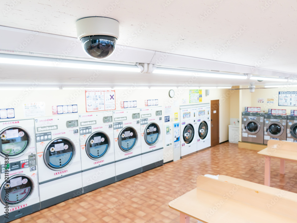 Foto de CCTV or surveillance operating in row of washing machine of ...