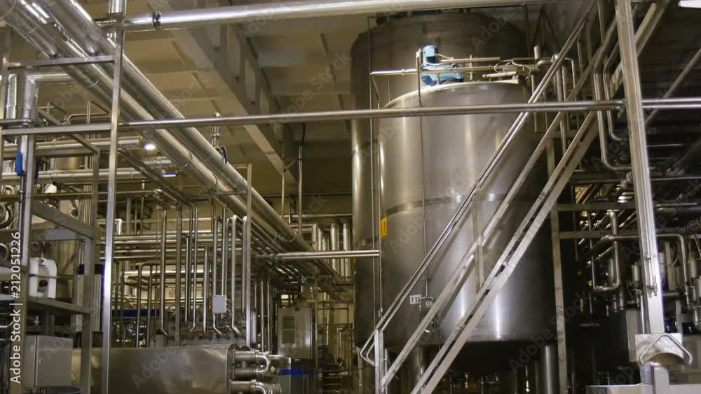 Part of the plant for fruit processing in factory for juice production ...