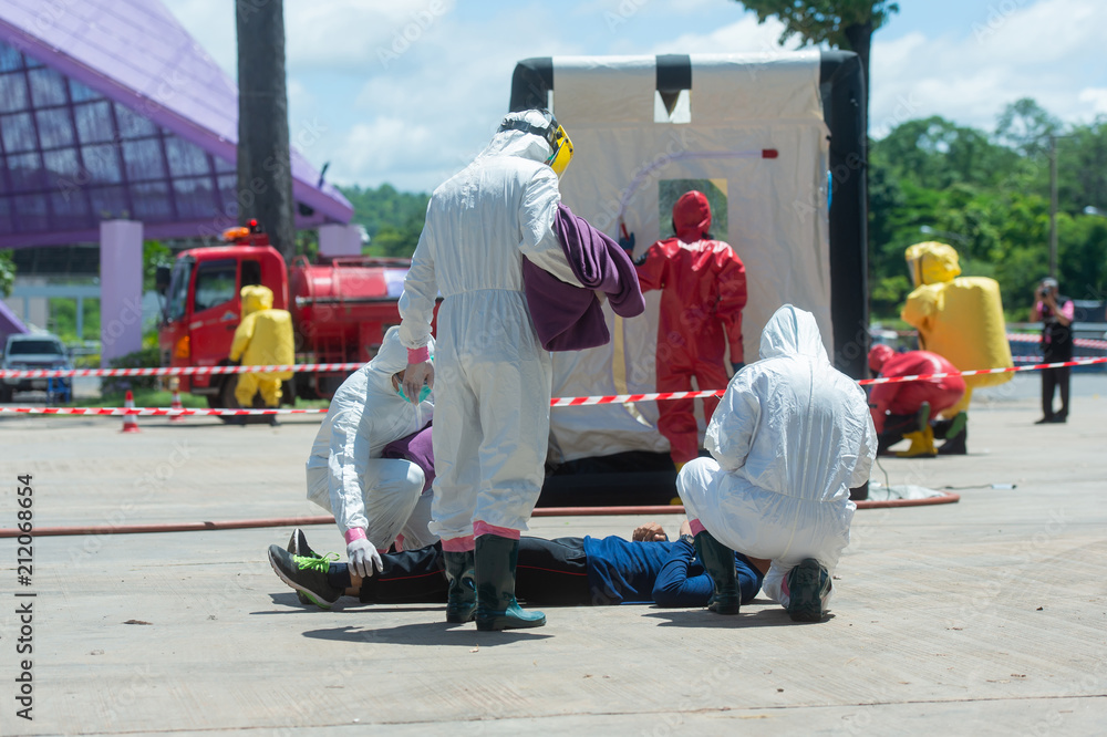 Fireman and hazard protection suit in hot zone tent Stock Photo | Adobe ...