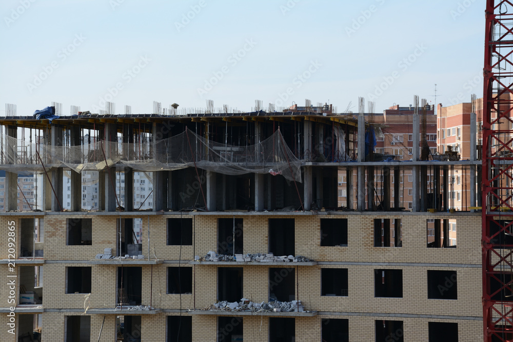 Construction of a multi-apartment residential building. The process of ...
