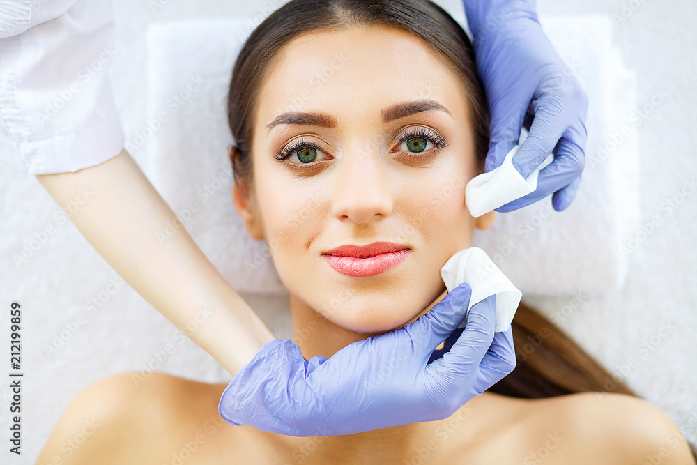 Skin Care Skin Procedures. Beautiful Young Woman in Spa Salon. Lying on ...