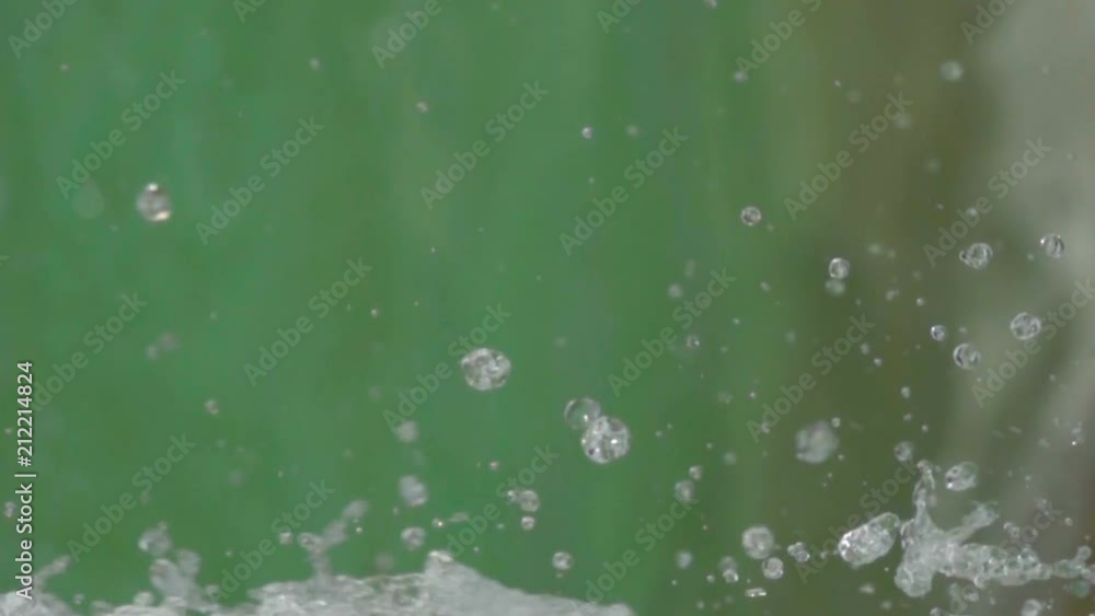 A horizontal whirlpool. Two streams of water to meet each other. Flying ...