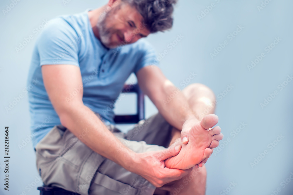 Man hand holding foot with pain, health care and medical concept Stock ...