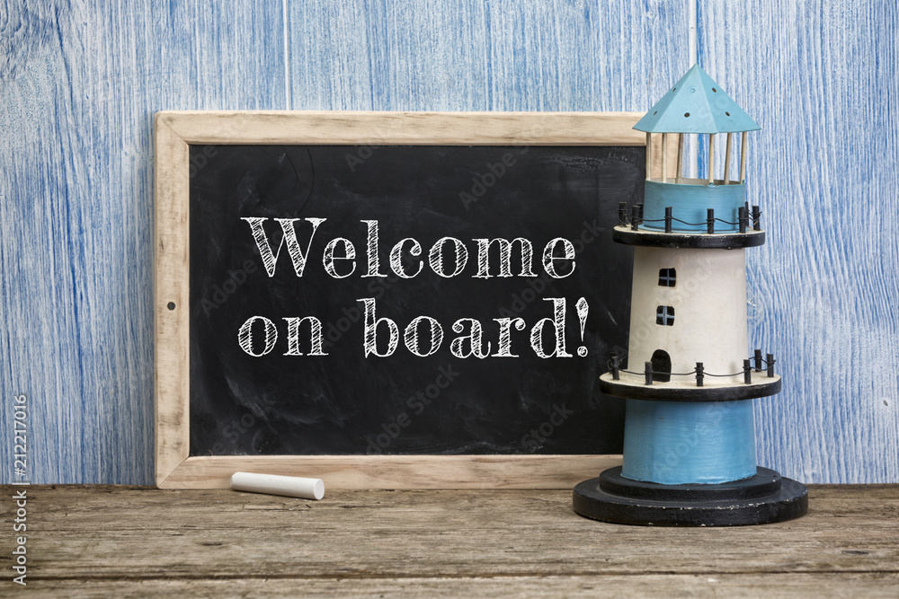 Welcome on board written on vintage chalkboard with lighthouse Stock ...