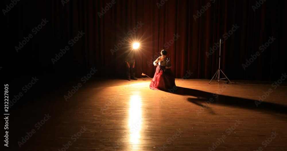Korean female musician playing the Haegeum which is the Korean ...