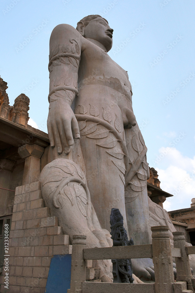 A gigiantic monolithic statue of Bahubali, also known as Gomateshwara ...