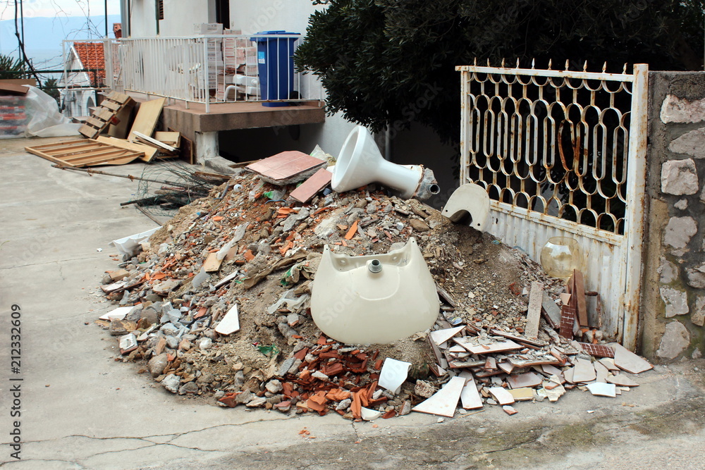 Pile of construction material waste in courtyard, from rubble, sand ...