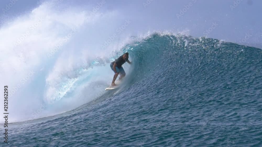 SLOW MOTION, CLOSE UP: Extreme photographer taking underwater photos of ...