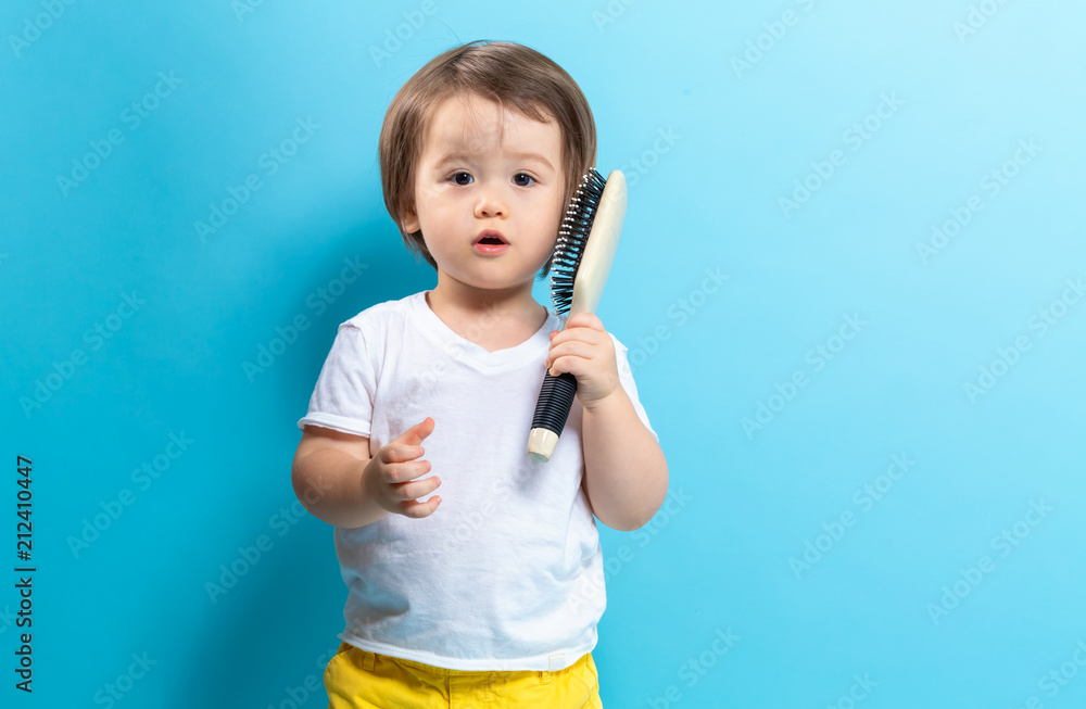 Toddler Brushing Hair