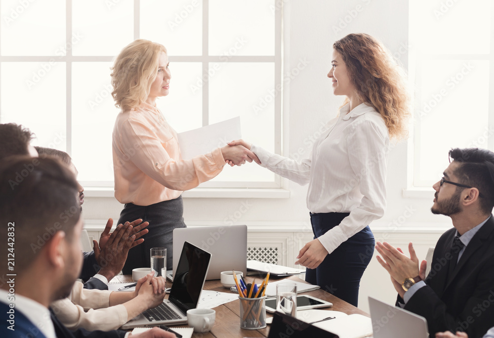 Boss Handshaking Employee Congratulating With Promotion - Stock ...