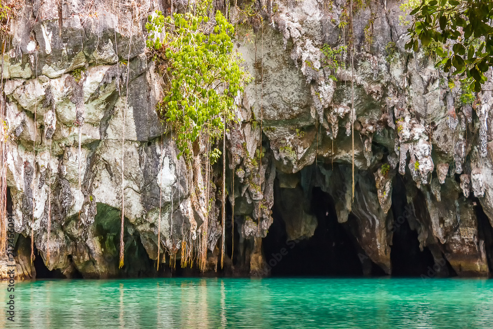 Entrance to the caves across the river. the island of Palawan. The ...