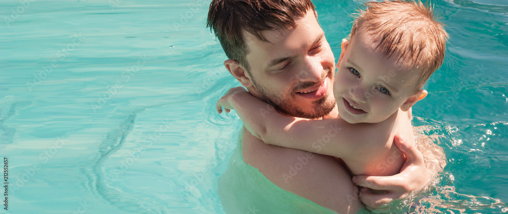 baby with dad swimming in the pool Stock Photo | Adobe Stock